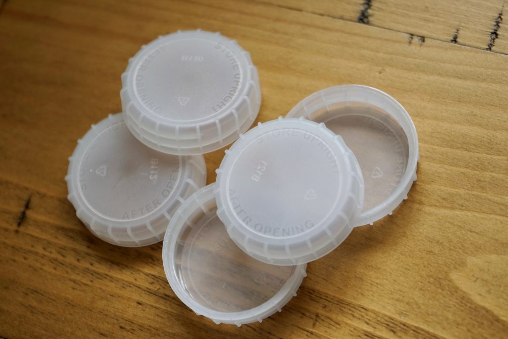 Müller to switch all milk bottle caps to clear to reduce plastic waste